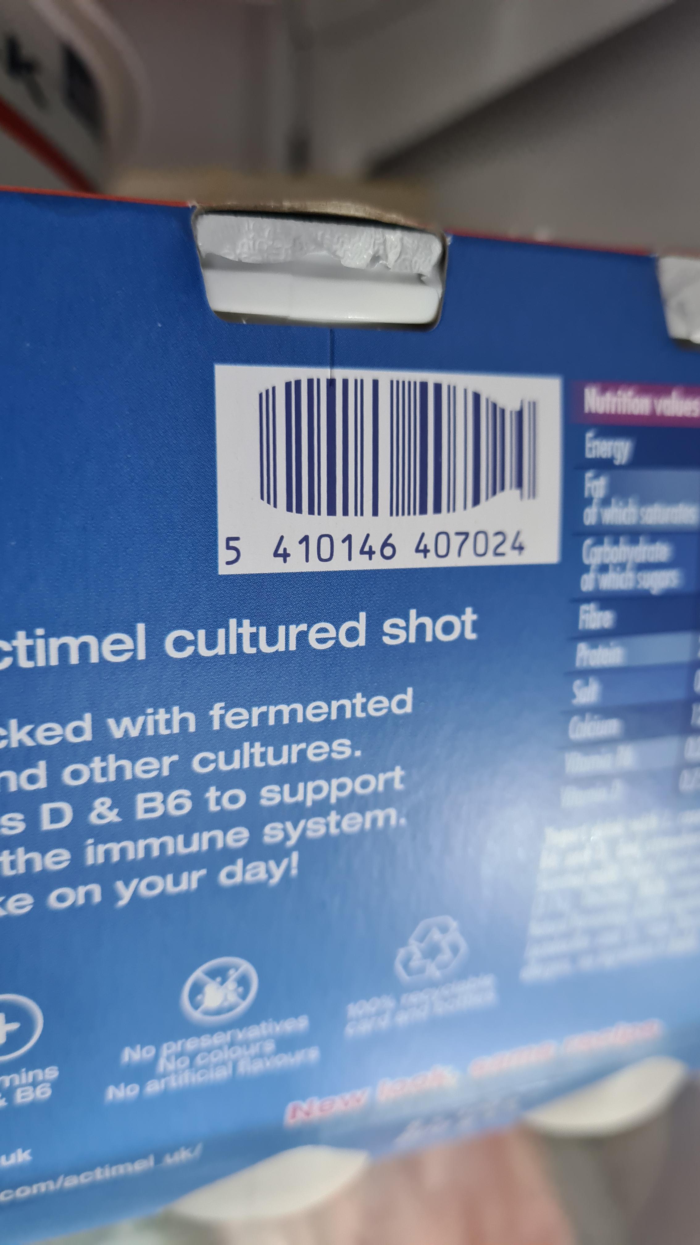 This barcode is shaped like the actimel bottle. | Scrolller