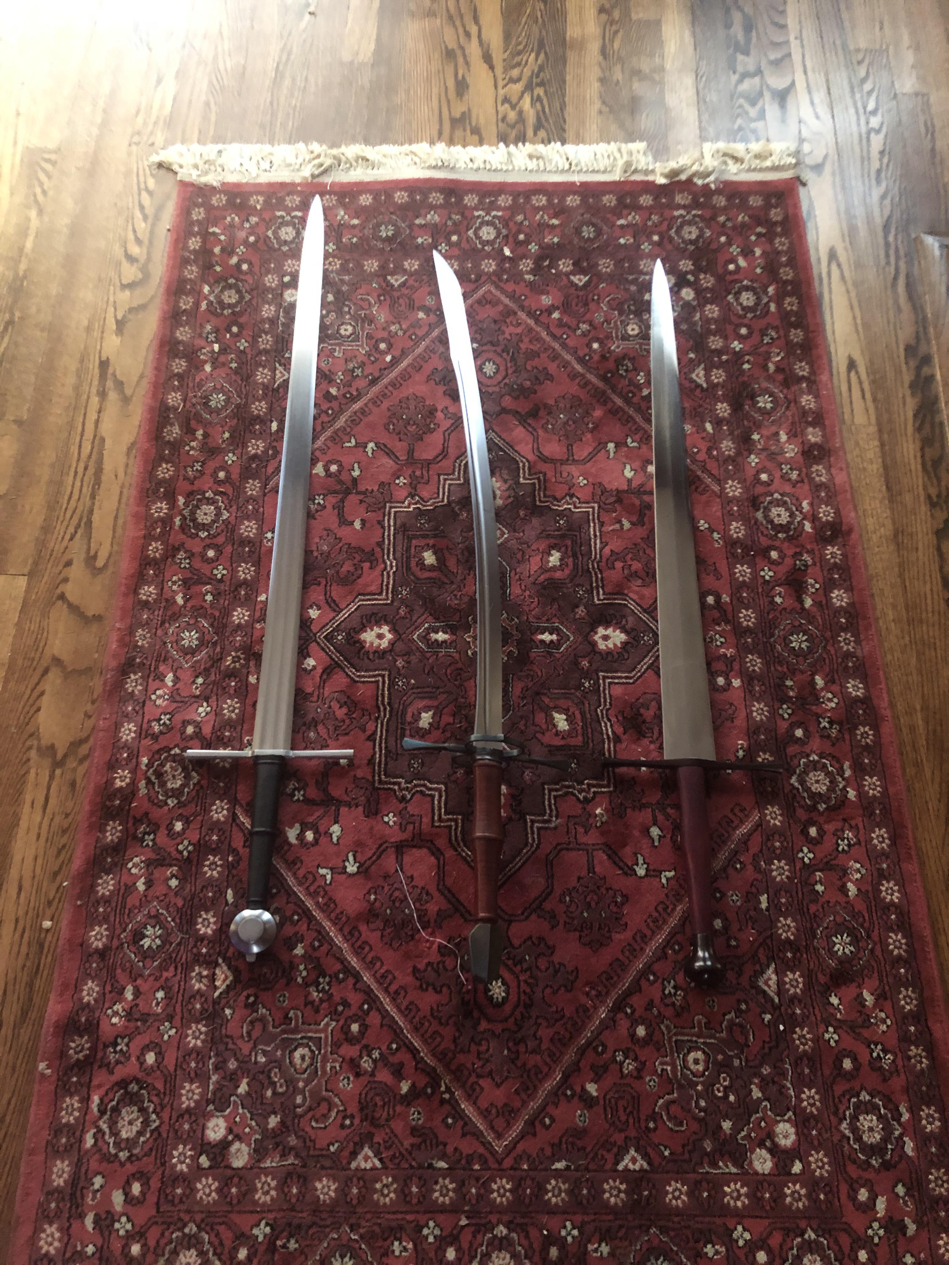 Three of my best longsword style weapons. | Scrolller