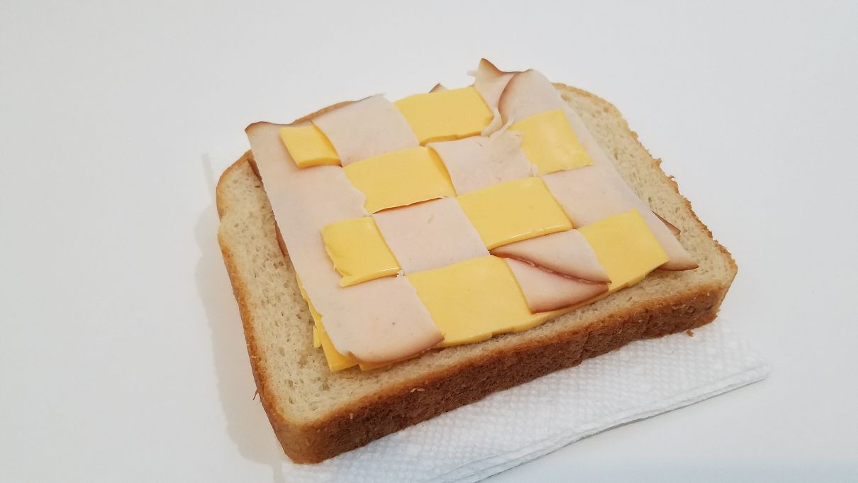Turkey and cheese lattice on white bread | Scrolller