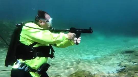 Underwater submachinegun magazine dump | Scrolller