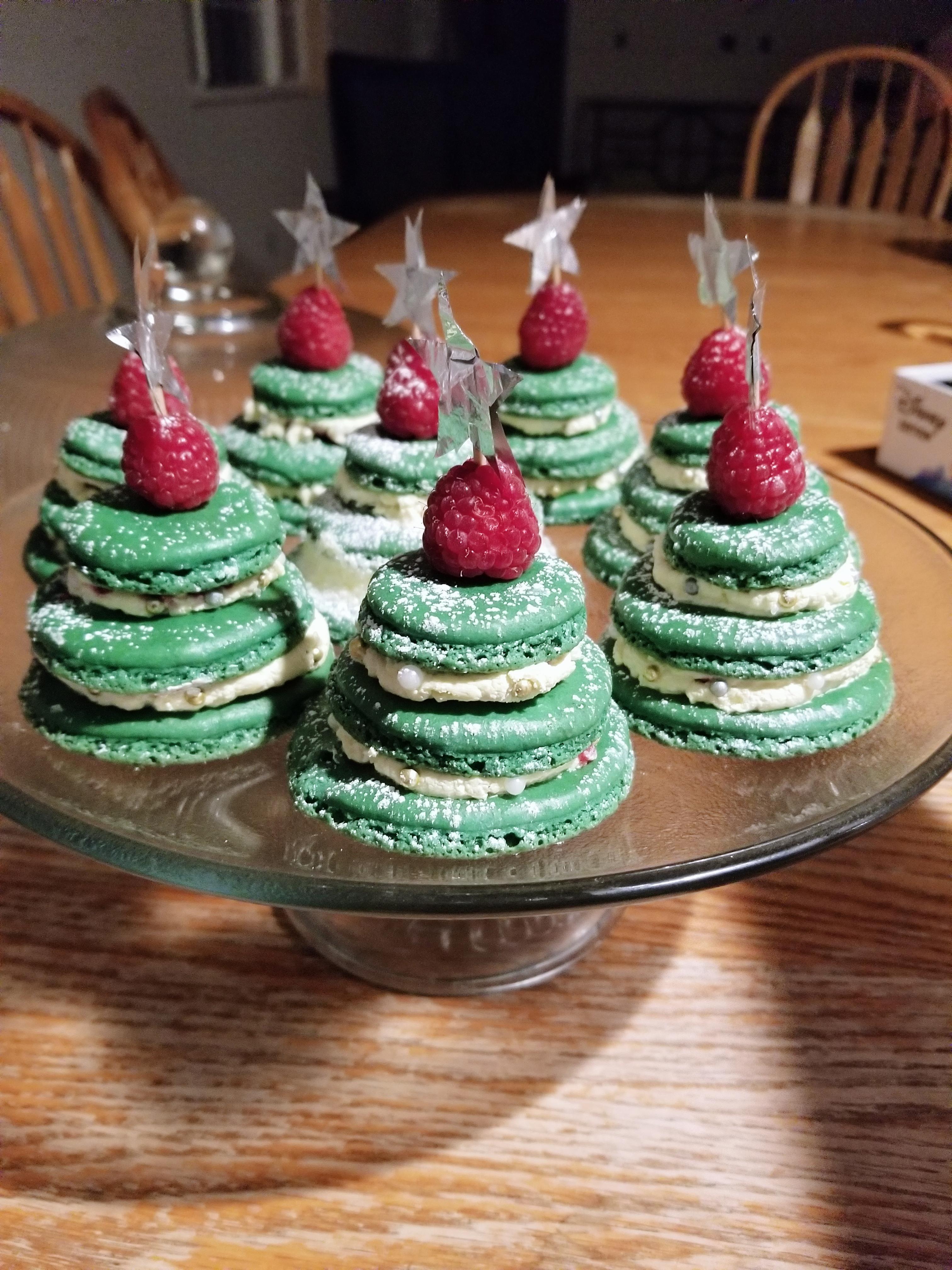 《Vanilla macaron Christmas trees with French buttercream and a fresh raspberry in each layer ...