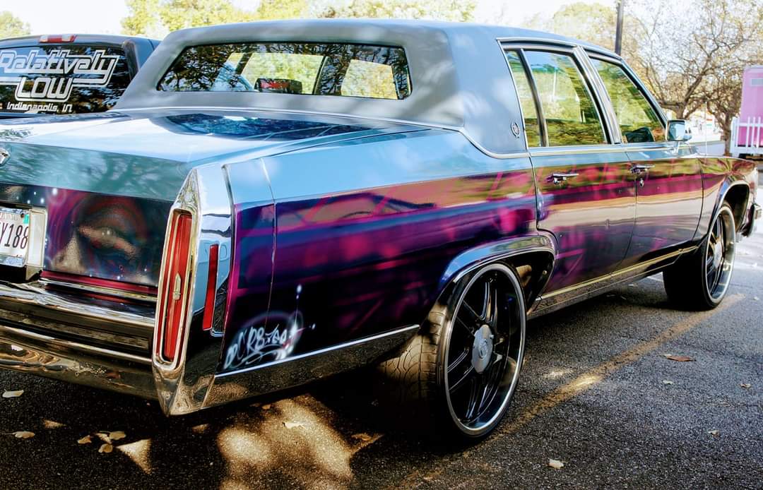 Wifes car...lowrider paint job sitting on 2's | Scrolller