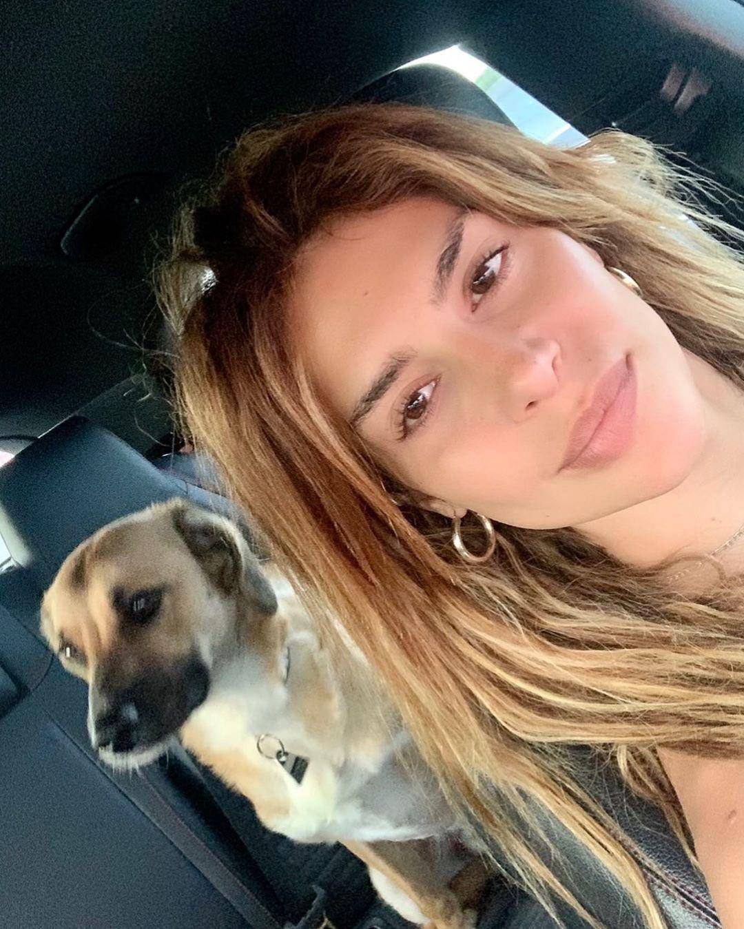 With her new dog | Scrolller