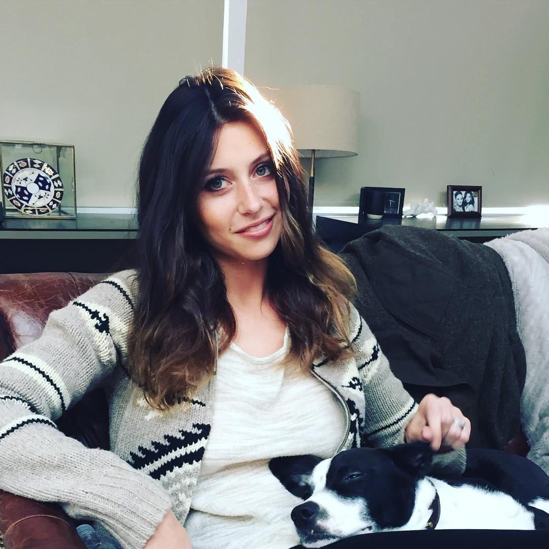 With her pup. | Scrolller