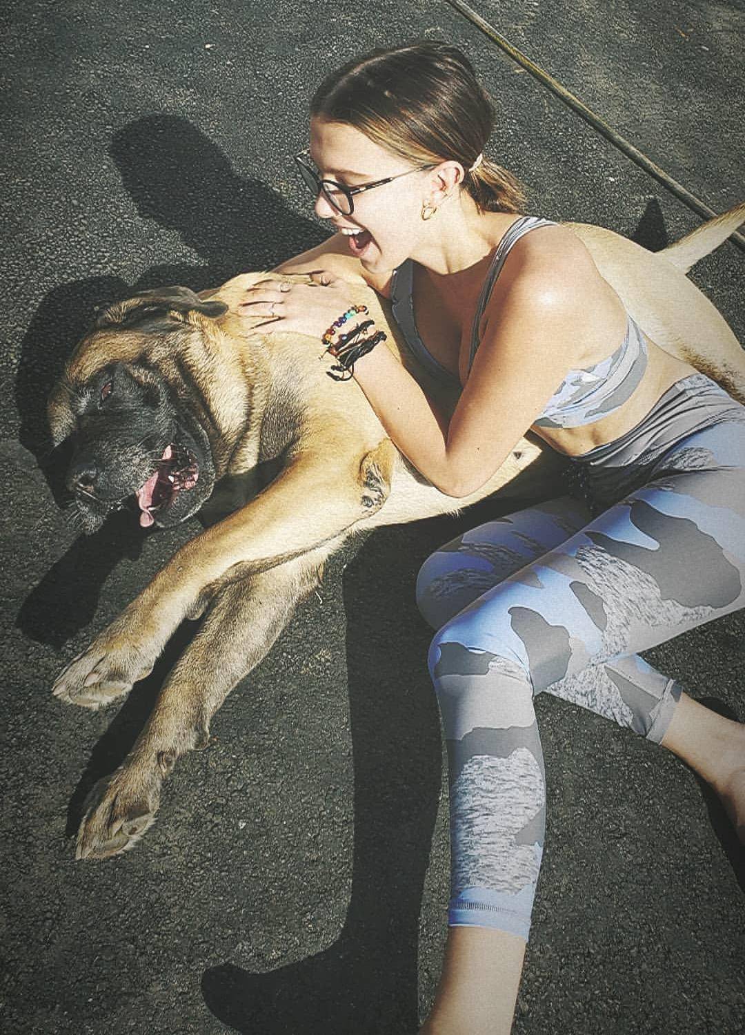 With one of her dogs | Scrolller