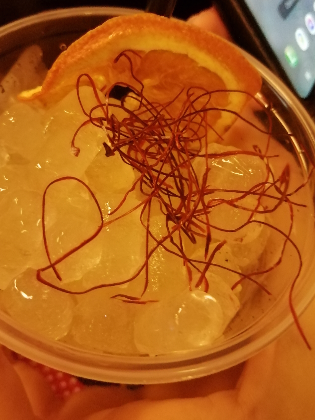 What are these stringy things on my gf's drink? | Scrolller