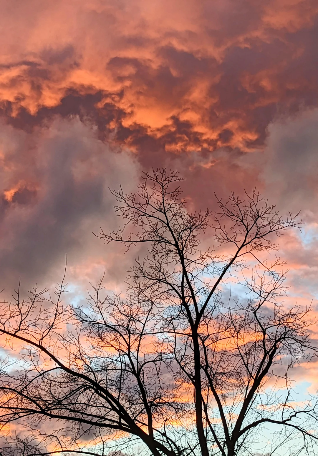 moody clouds with layers of color | Scrolller