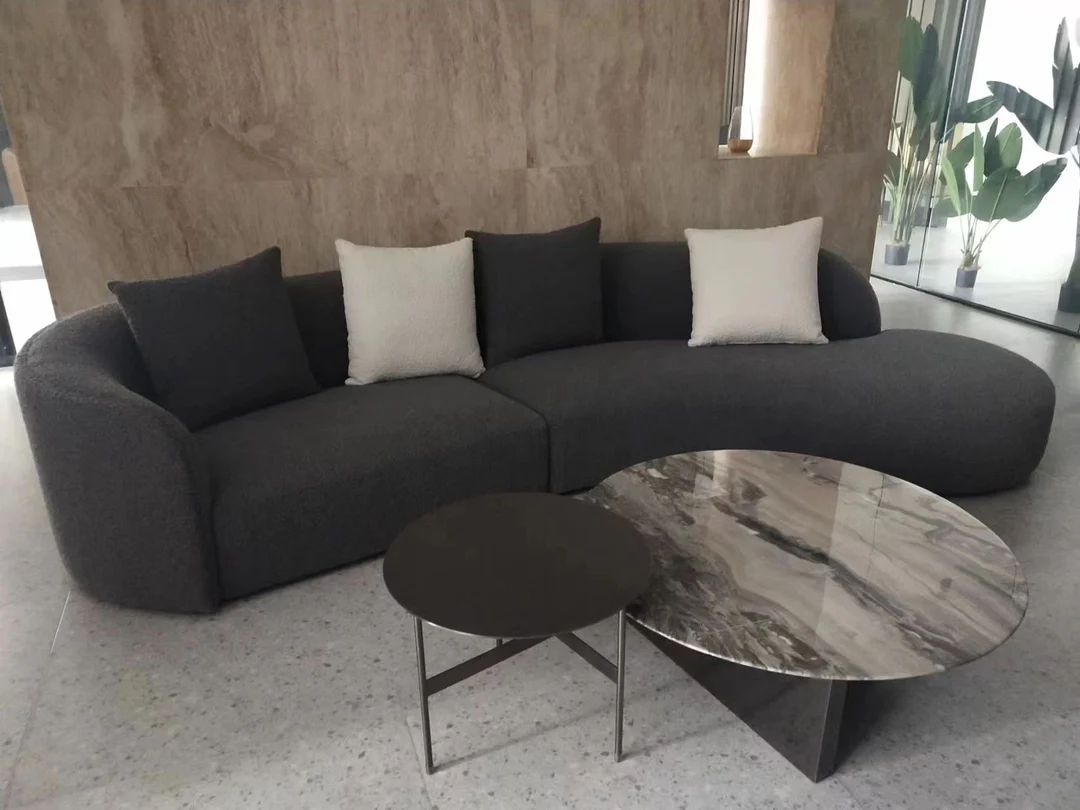 Cozy sofa with two coffee tables | Scrolller