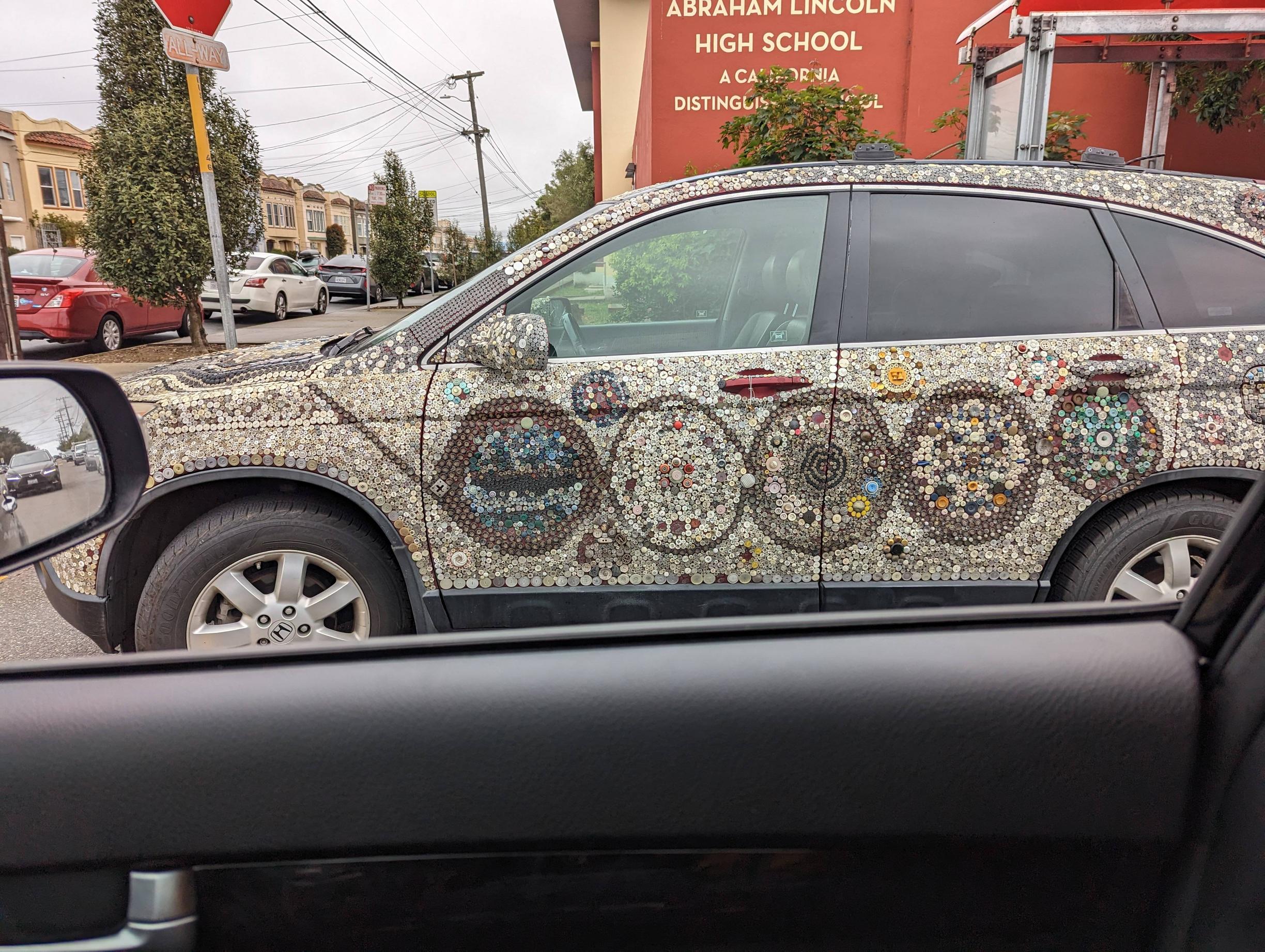 A car covered in buttons | Scrolller