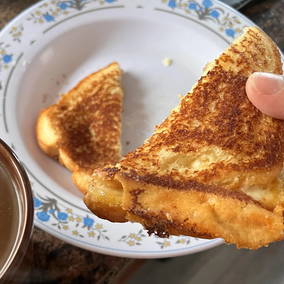 Muenster cheese on butter bread | Scrolller