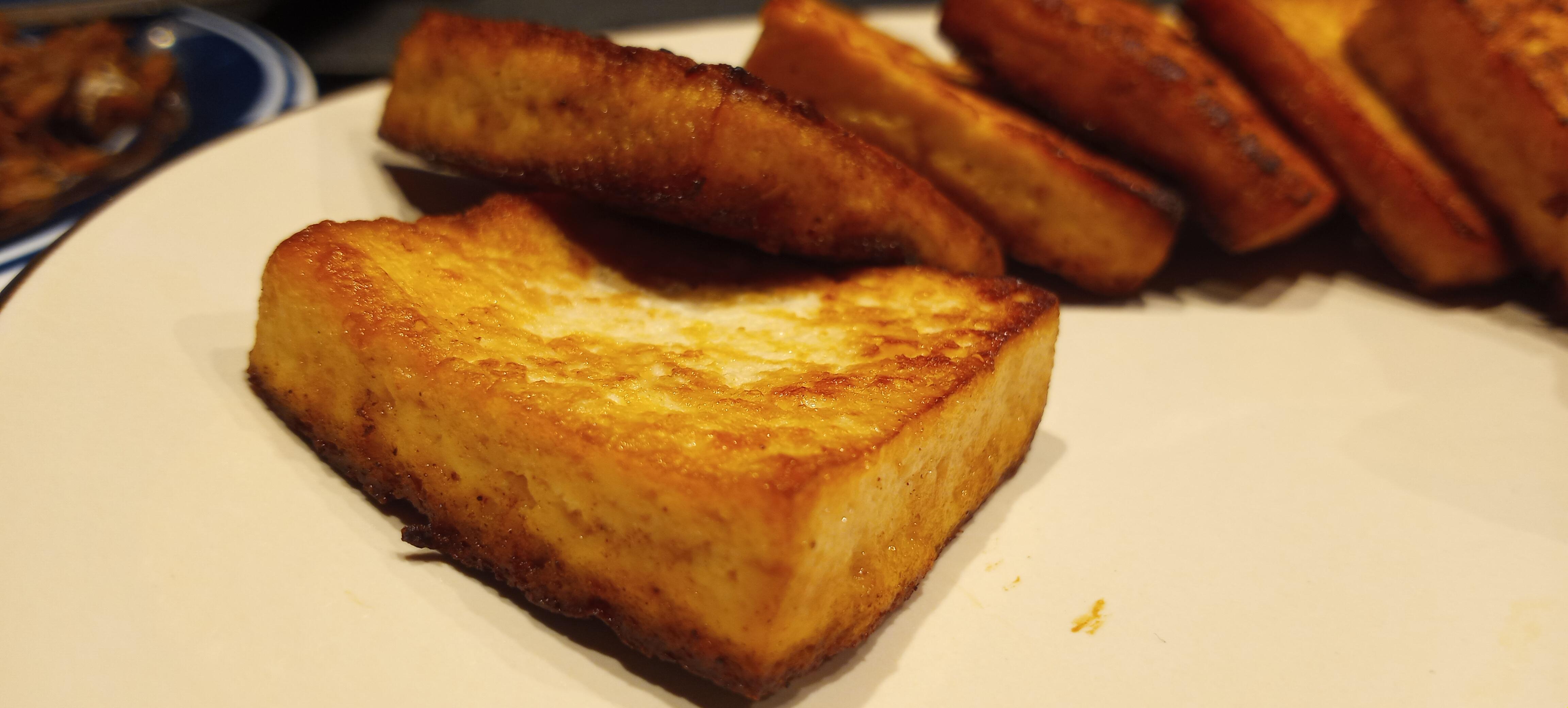 [homemade] two inch sliced and pan fried extra firm tofu marinated in La Choy low sodium soy ...