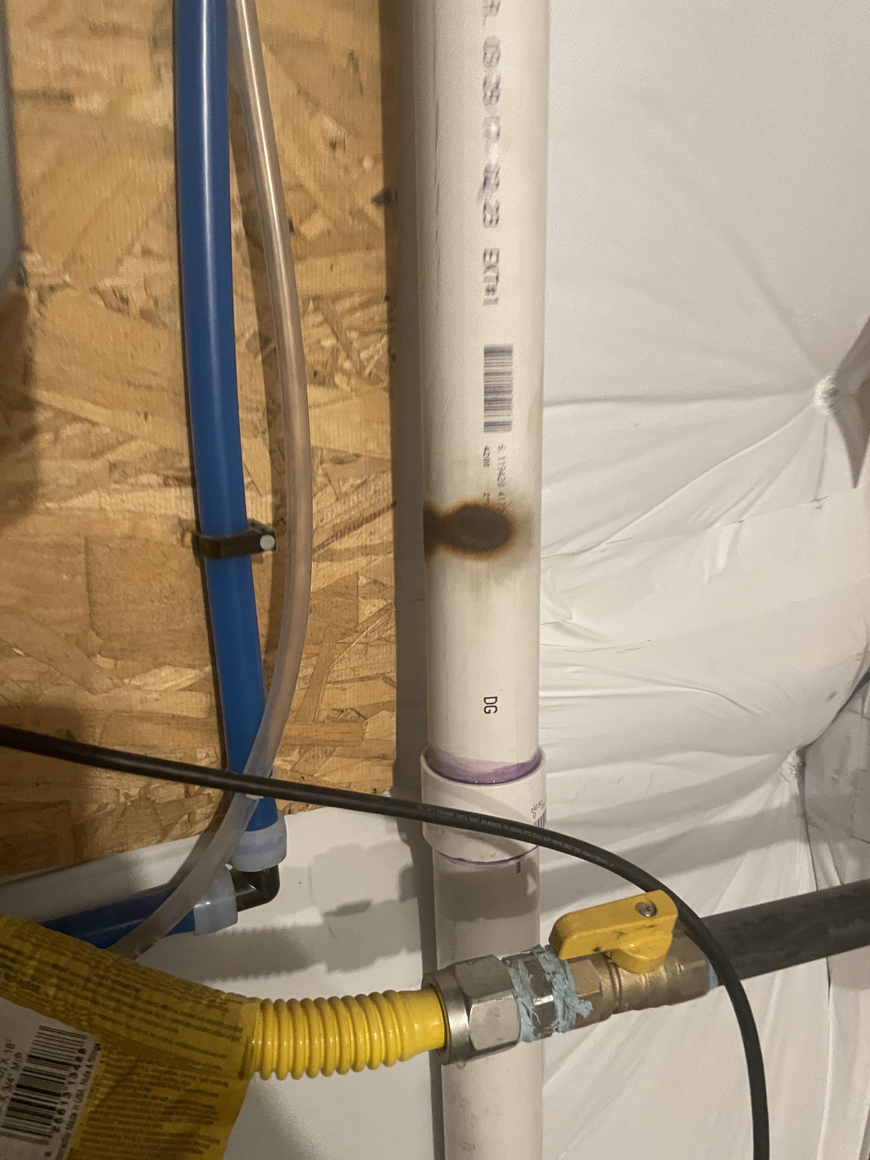 Noticed this on a pvc pipe in the basement. Looks like rust or a burn. Should I be concerned ...