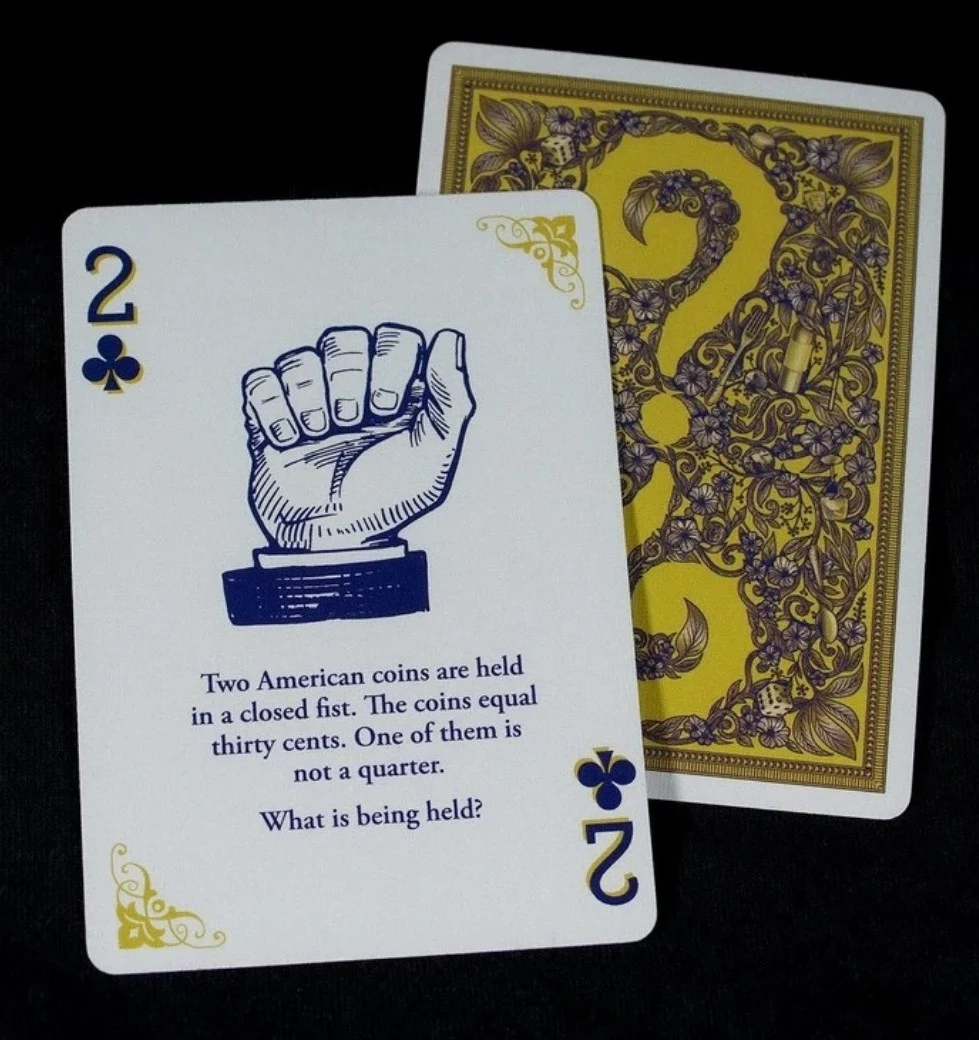 A beginner level coin puzzle from Bamboozlers Playing Cards | Scrolller