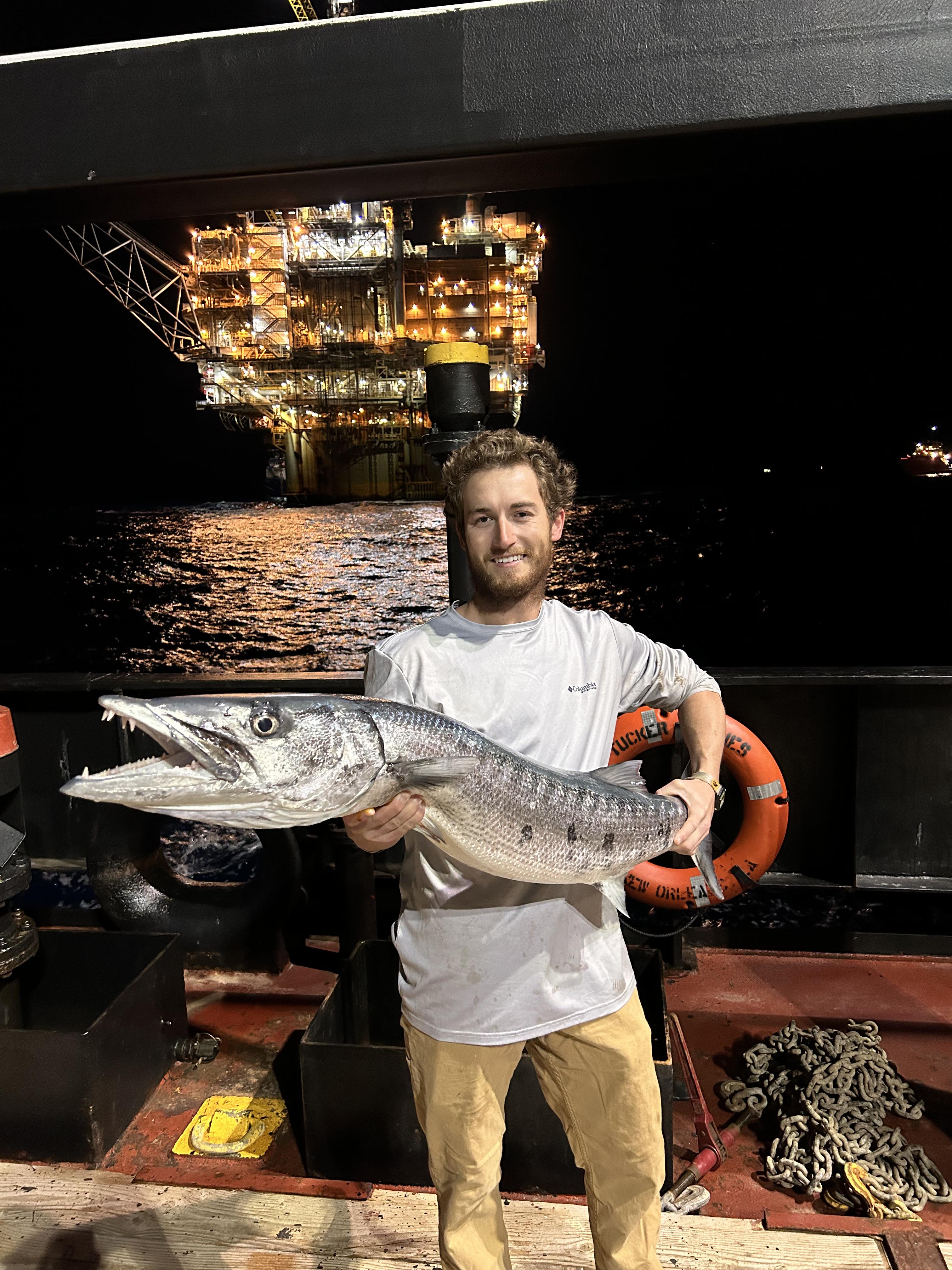 Barracuda next to a platform | Scrolller