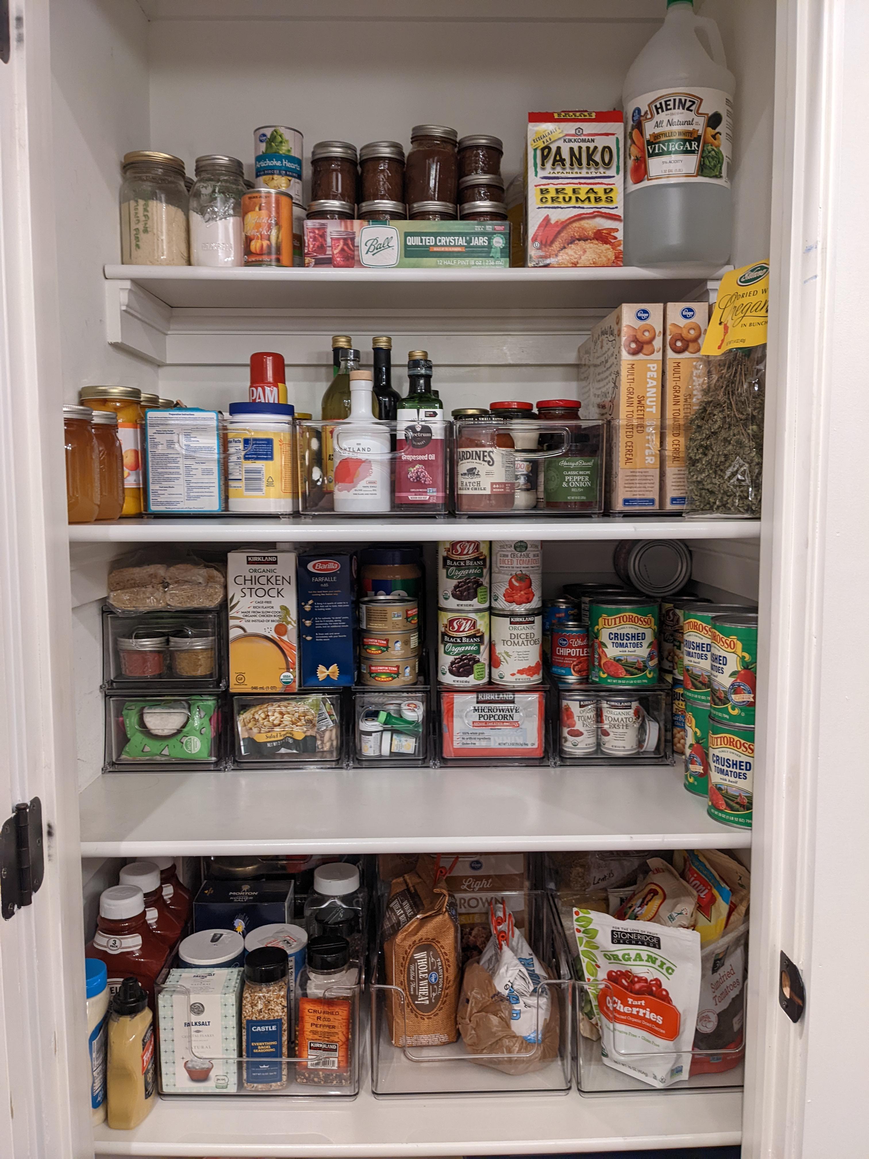 A challengingly deep pantry organized for easy visualization and access to items. | Scrolller