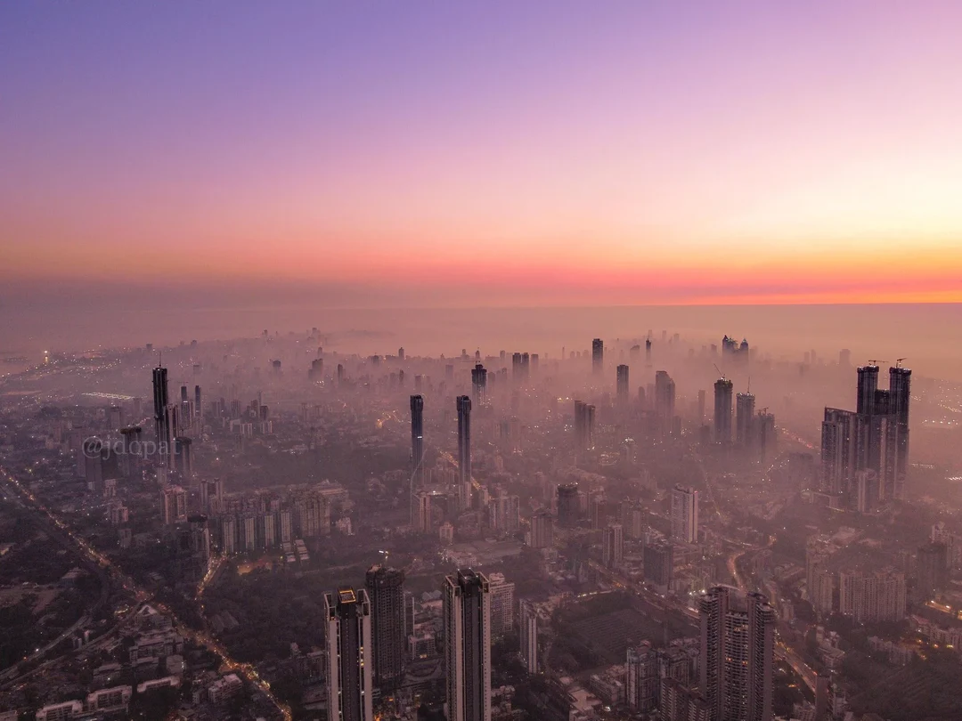 Discover more like CityPorn: Mumbai winter sunset with smog flowing through city and Related ...