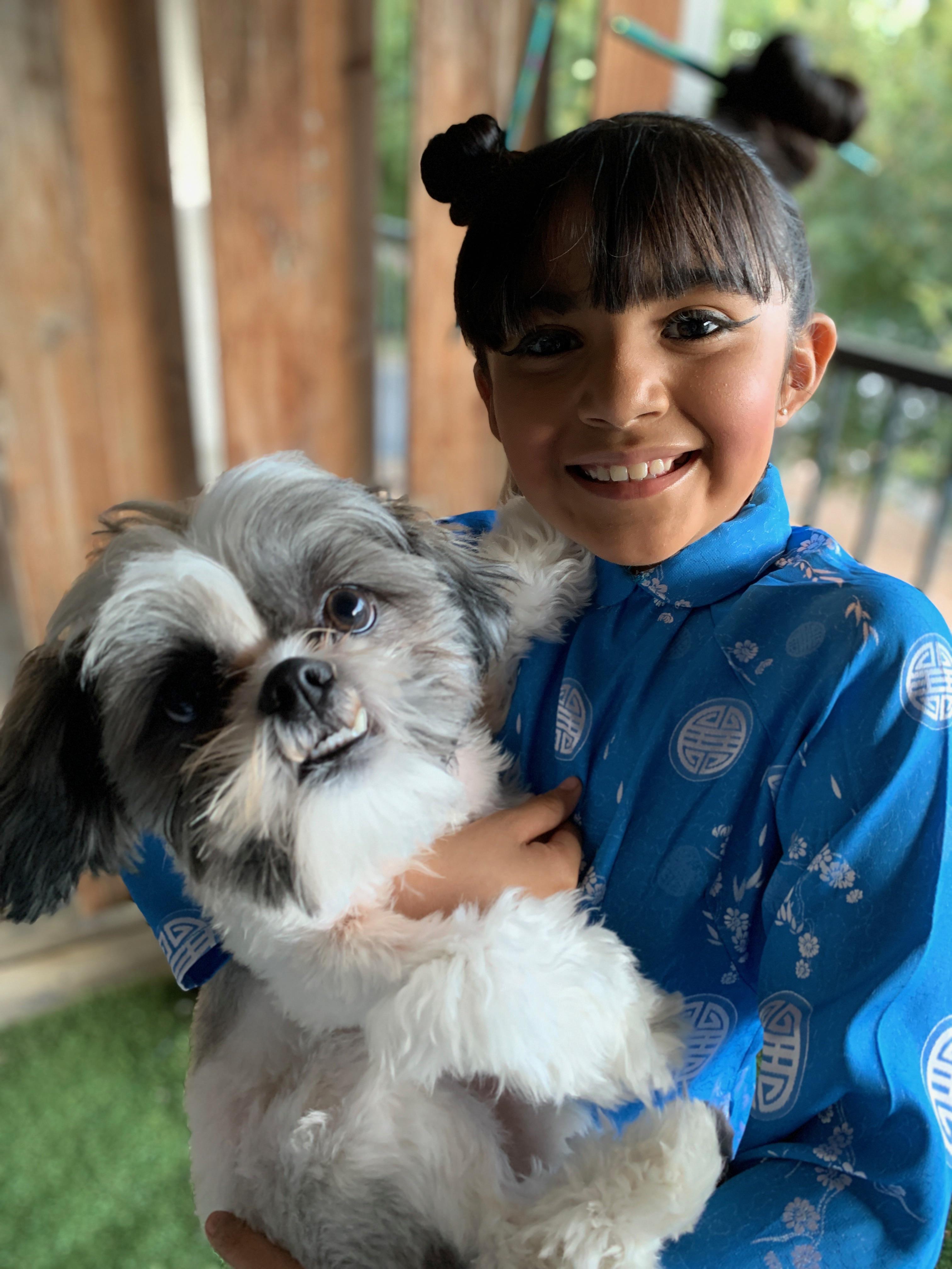 My daughter and Anthony The Shih-Tzu. | Scrolller
