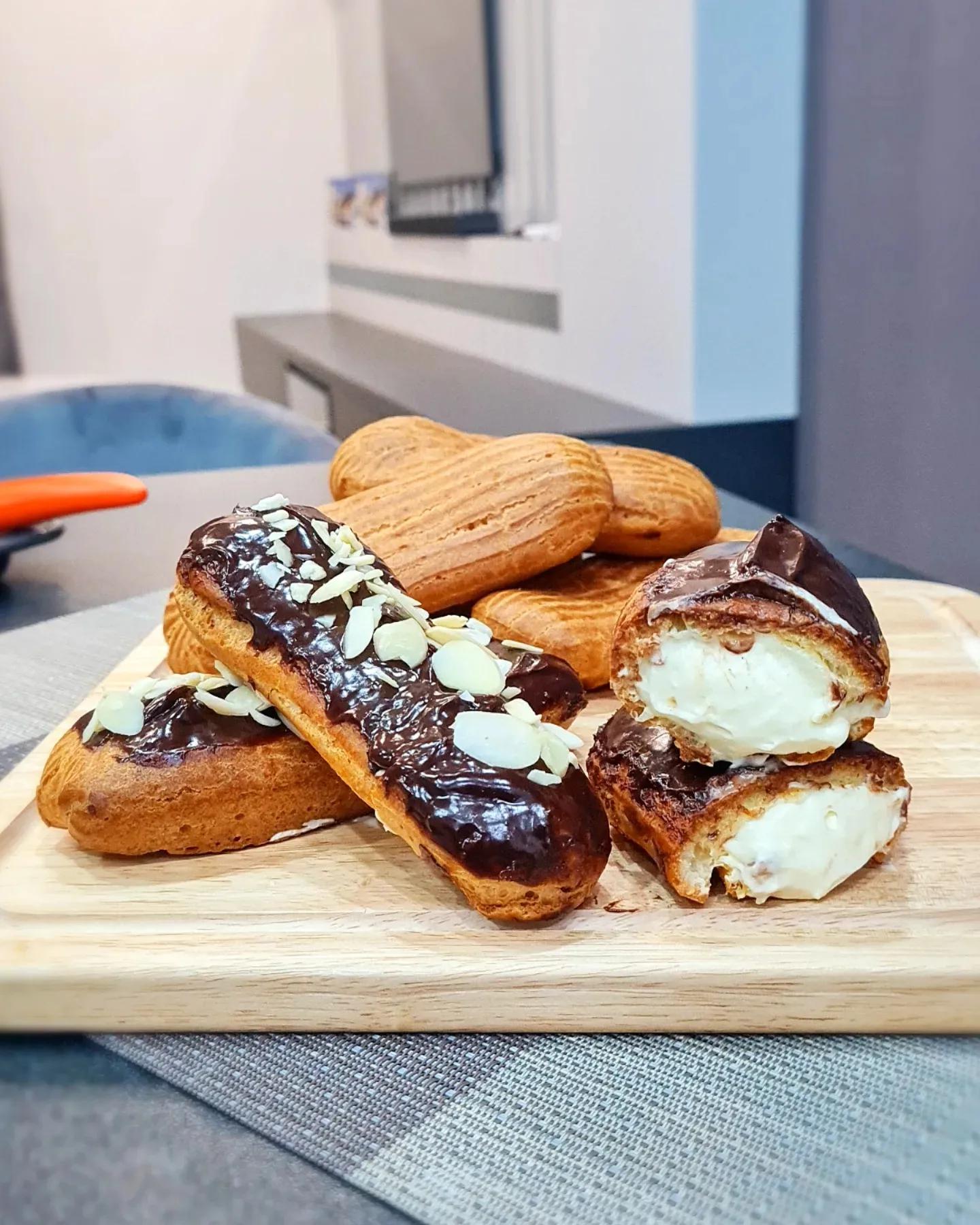 [homemade] Eclairs with custard cream and chocolate ganache almond flakes | Scrolller