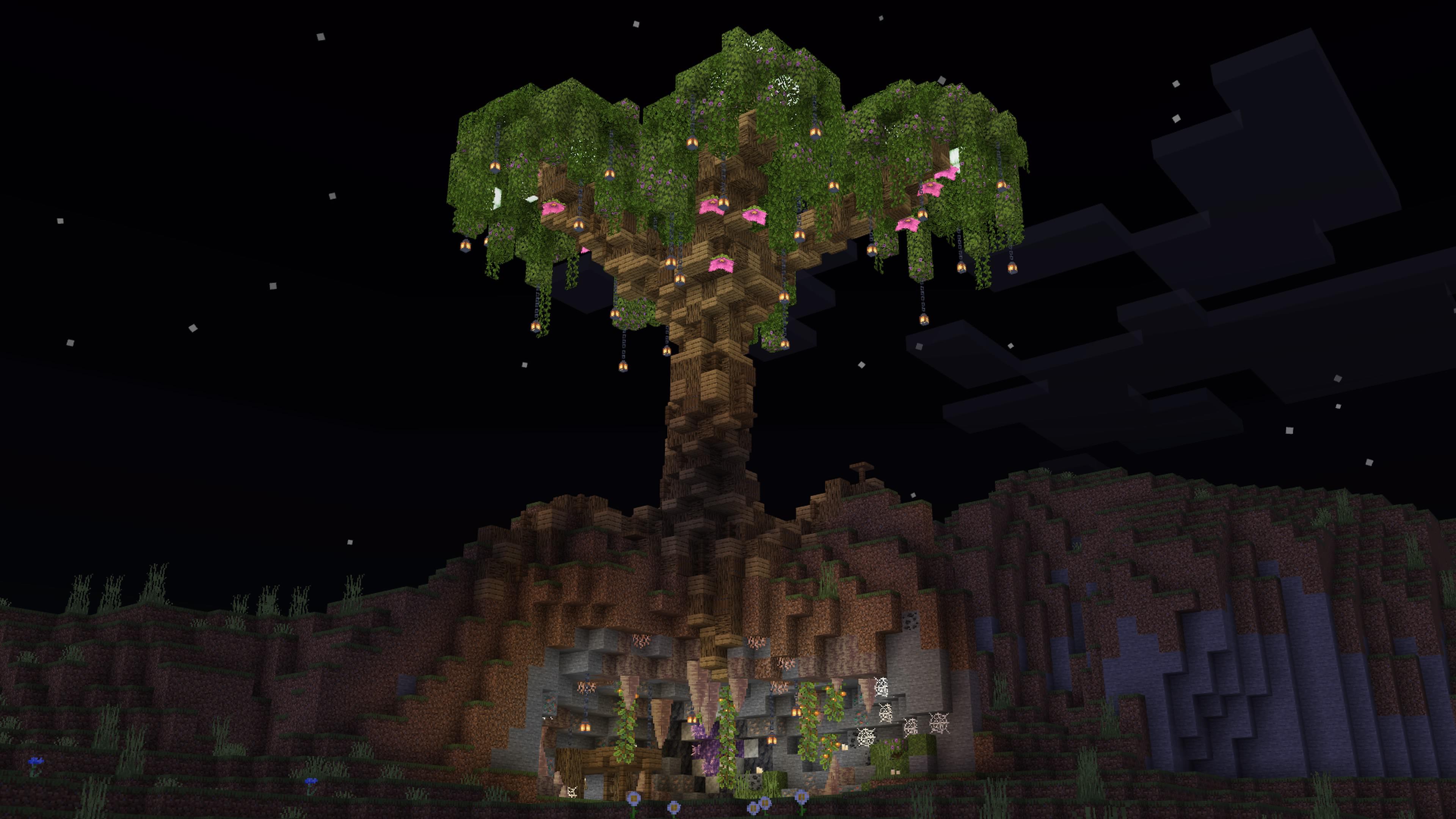 Giant tree at end of village path above cave | Scrolller