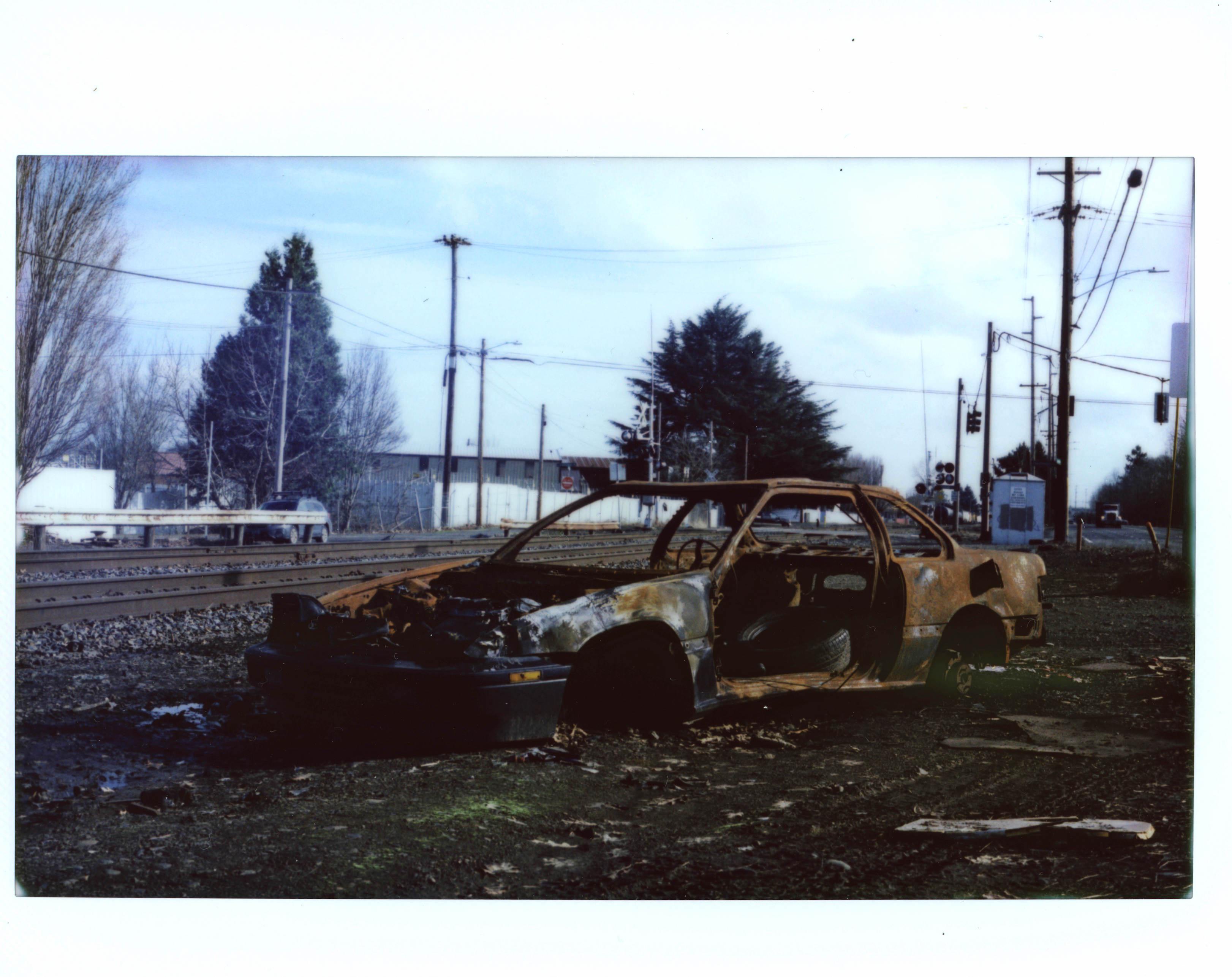 Rusted Car on the Train Tracks | Scrolller