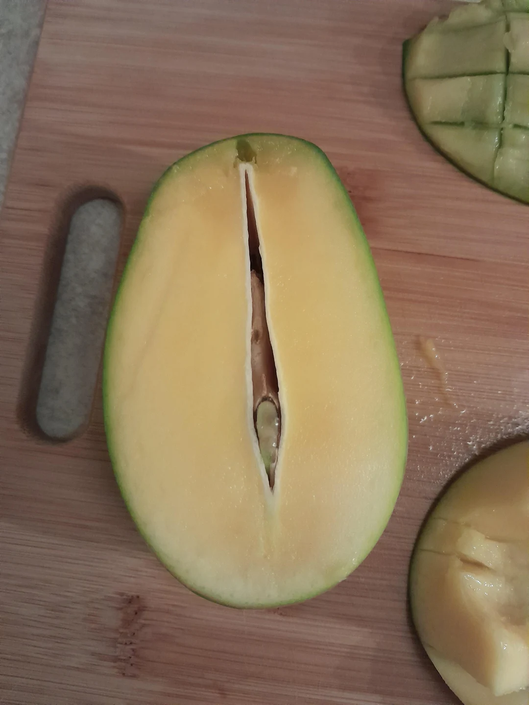 I was cutting a mango for the first time, wasn't sure how to do it properly, so this happened ...