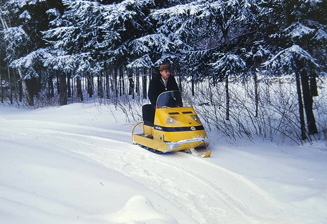 A man riding his single-ski snowmobile in the 1960s | Scrolller