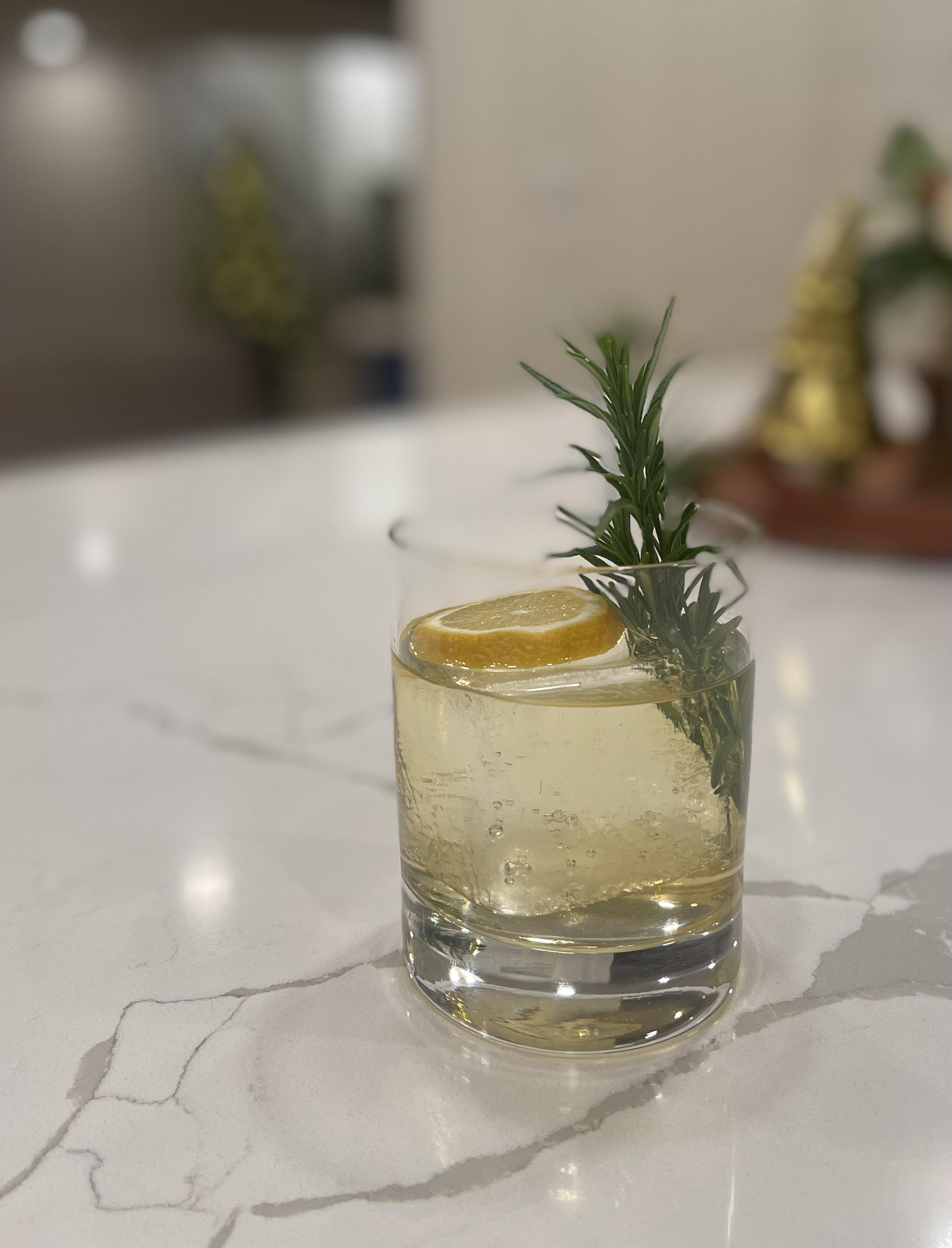 Clarified smokey rosemary sour | Scrolller