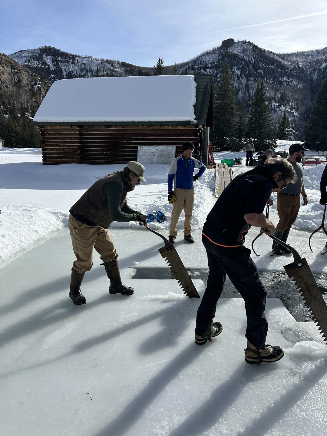 Sawing 18” thick ice | Scrolller