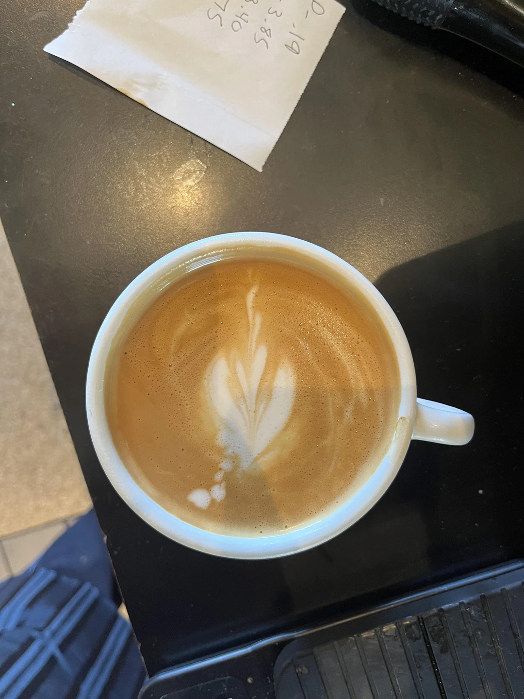 Got my sister a job at the cafe I work at. I'm her trainer. This is her first attempt at latte ...