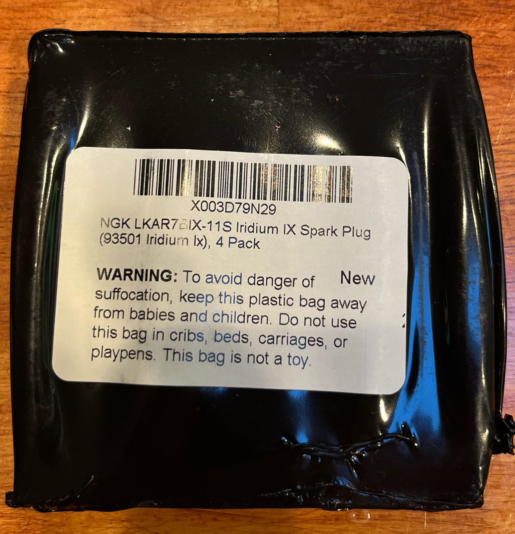 My 4 pack of spark plugs came with a suffocation warning | Scrolller