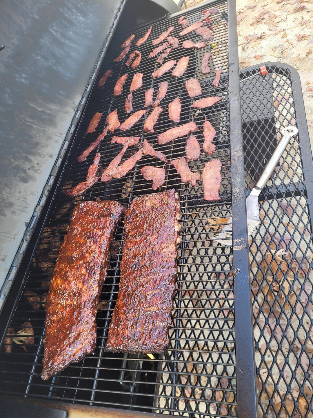 Spare ribs and beef jerkey on the reverse flow offset | Scrolller