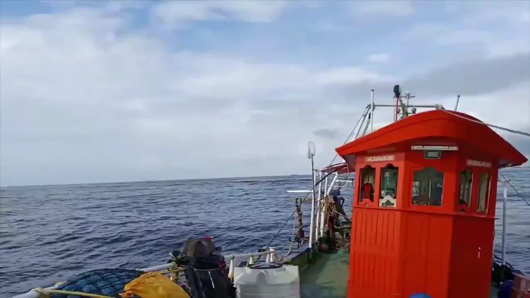 Fishermen encounter an aircraft carrier in the deep seas. | Scrolller