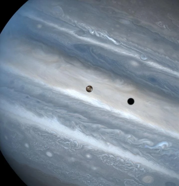 Jupiter's moon Io eclipsing the Sun. Io is roughly the size of Earth's moon | Scrolller