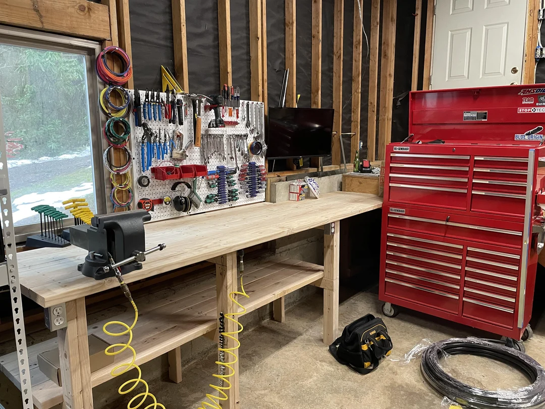 Finally got my workbench built and the tool wall set back up after moving. | Scrolller