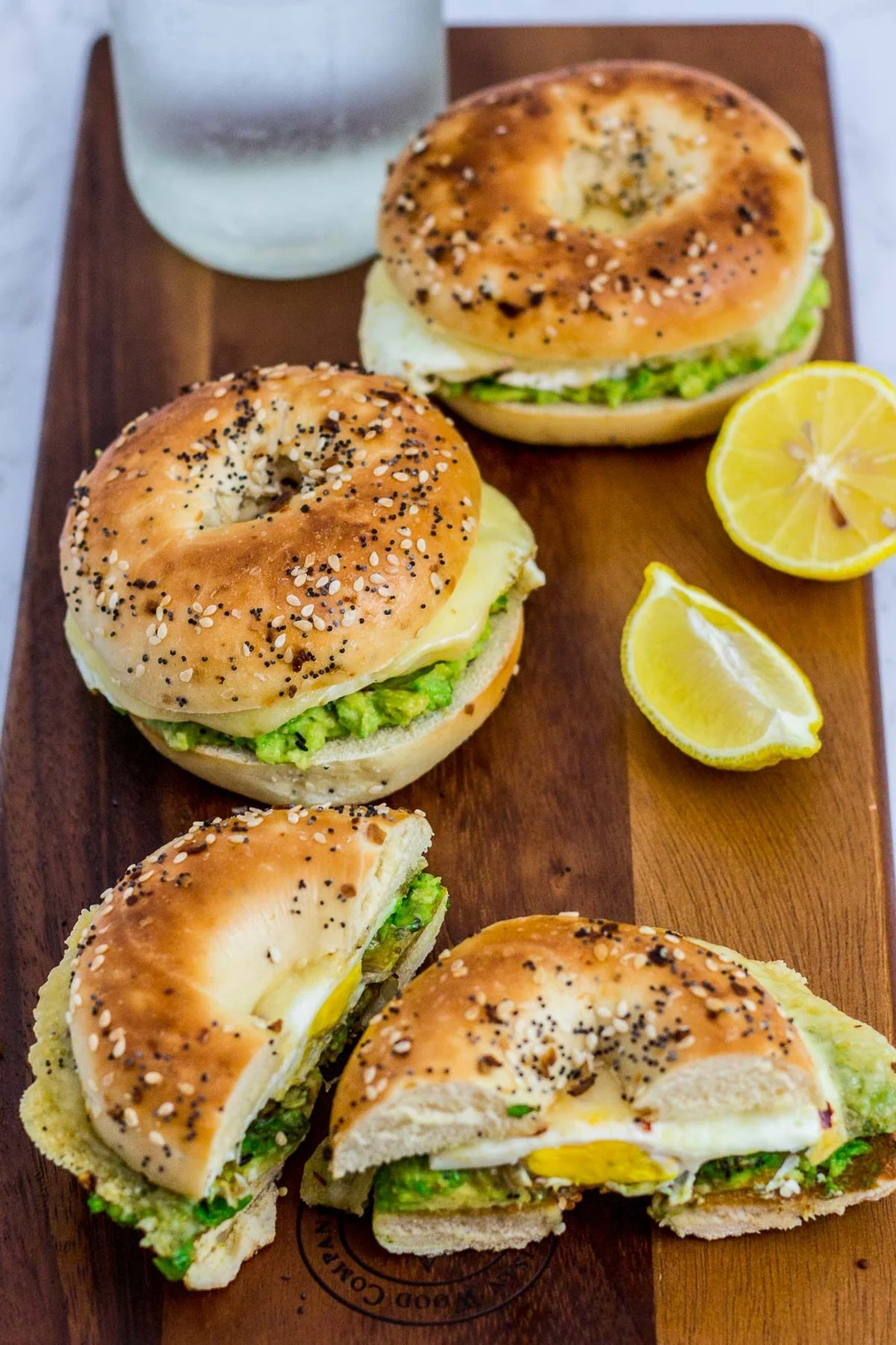 Avocado bagel breakfast sandwich with fried egg | Scrolller