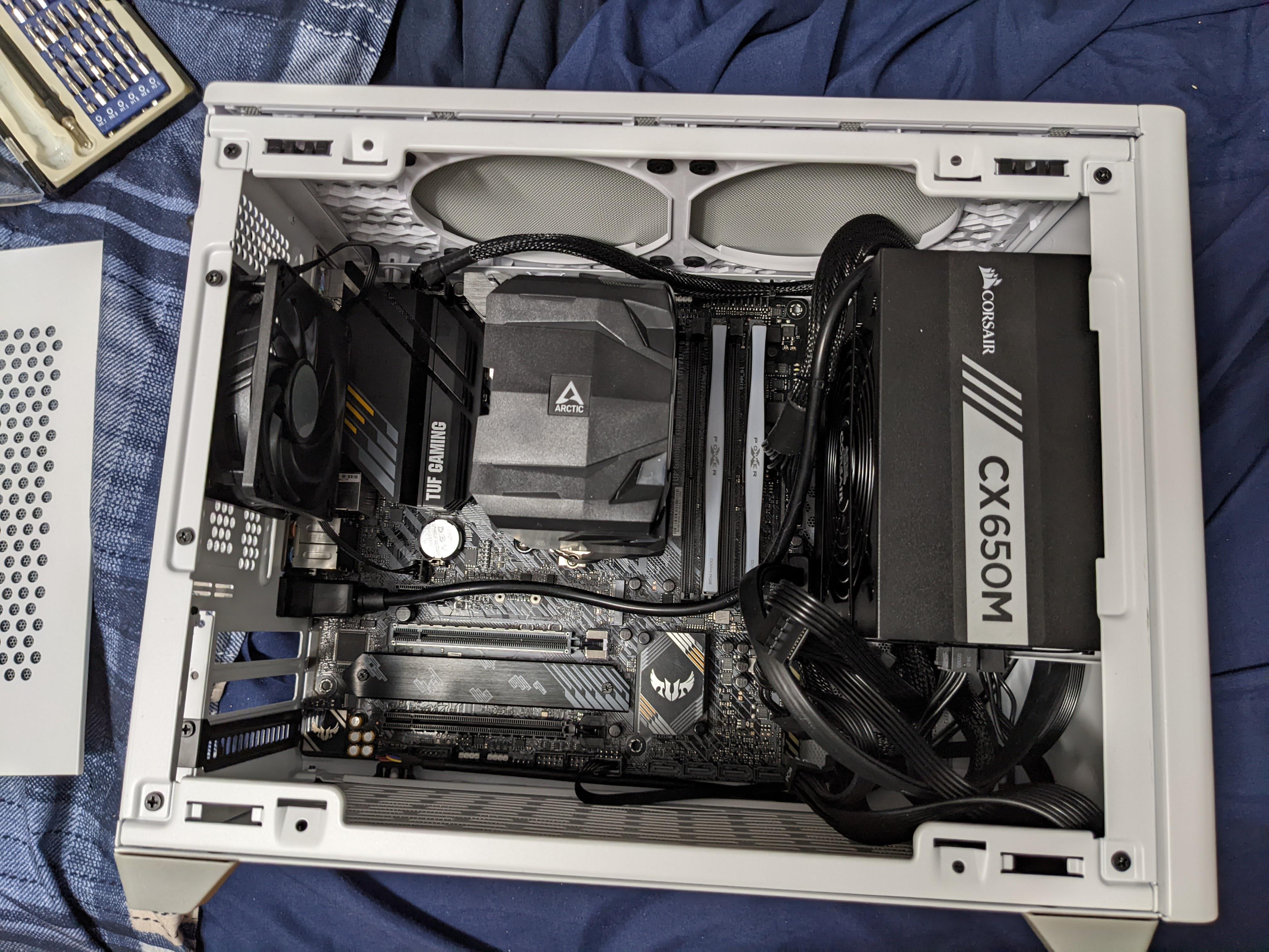 Modded this NR200 to fit a micro ATX and standard size PSU with full length GPU. As SFF as you ...