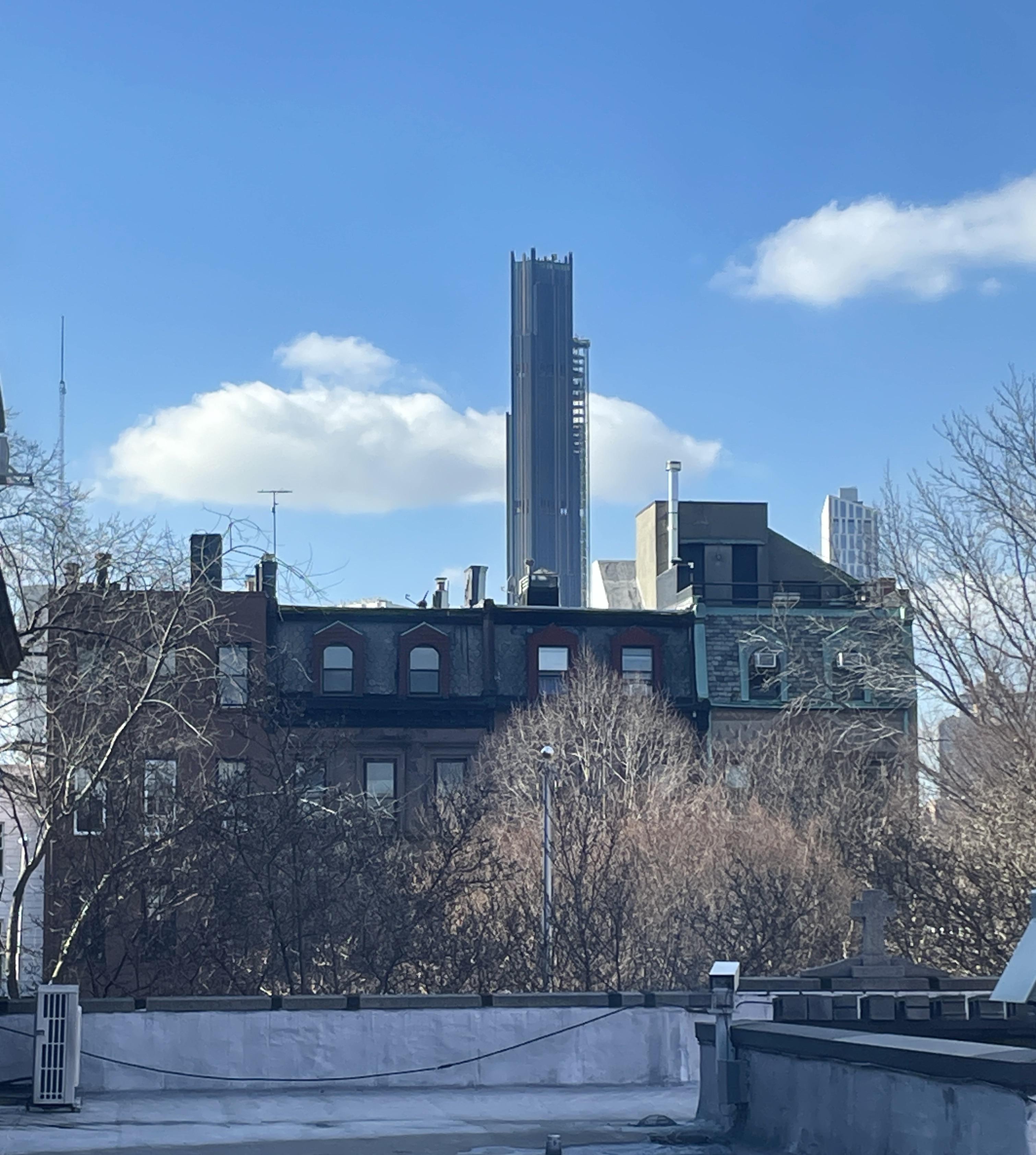Brooklyn Tower looming over Brooklyn (OC) | Scrolller