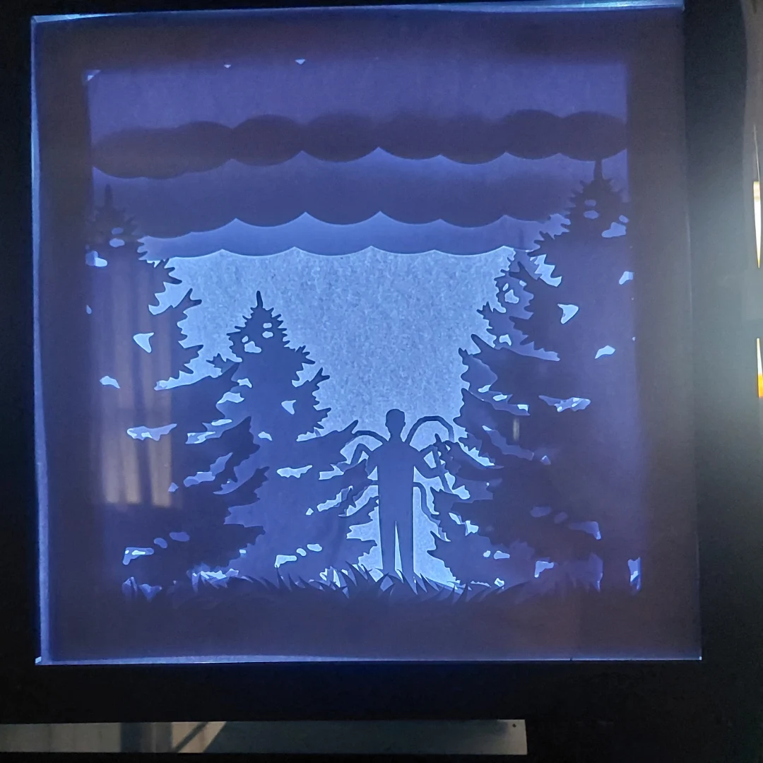 "He watches", Me, papercut box, 2022 | Scrolller