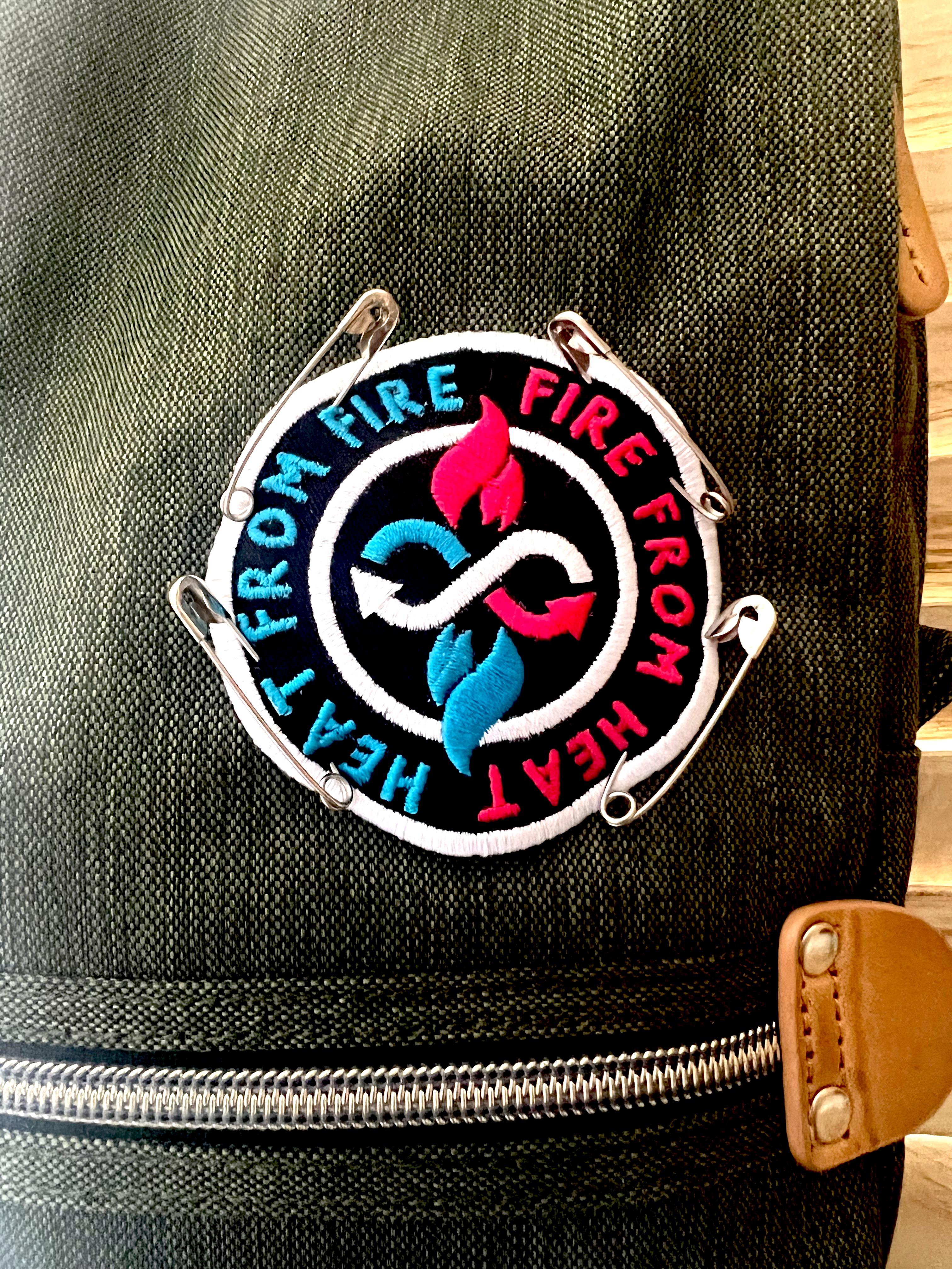 Finally got my Official Team Trans Patch ™! Still deciding on placement, hence the safety pins ...