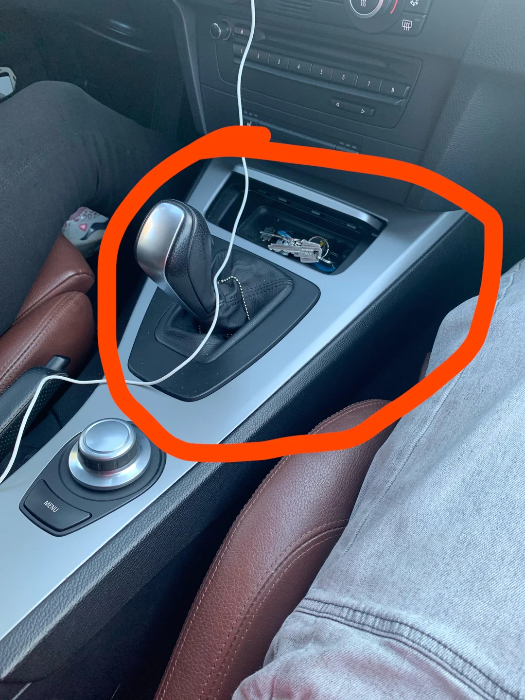 My moms black universal e91 2008's bottom center console gets really hot while driving | Scrolller