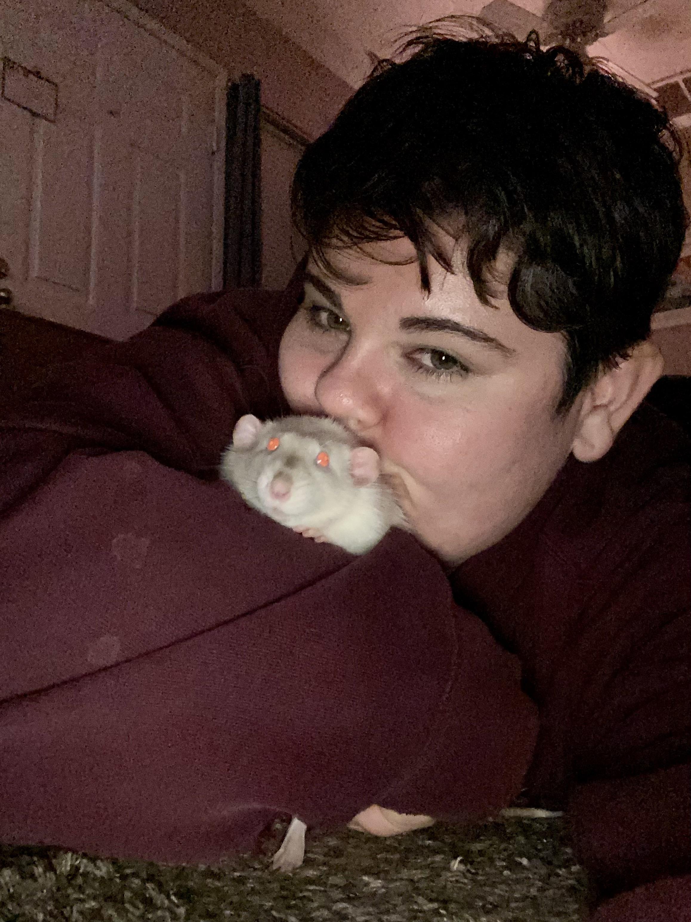 Grabbed this pic before he squirmed away! (He pretends he doesn’t like it but then he comes back ...