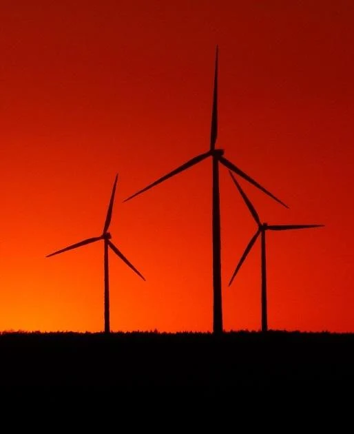 Red sunset, windturbines in germany. | Scrolller