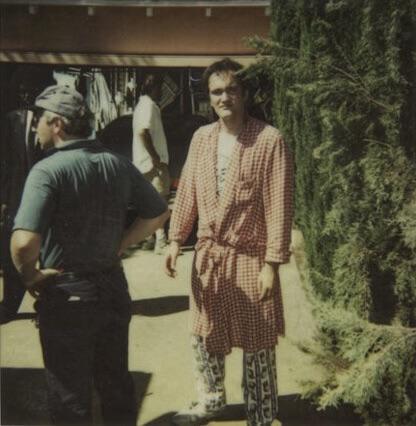 Quentin Tarantino on the set of "Pulp Fiction" (1994) | Scrolller