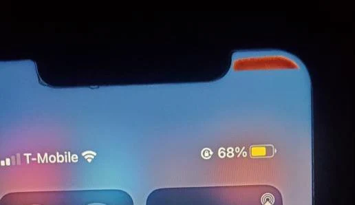 (iphone XR) What is this in the corner of my screen? Dead or stuck pixels? Any fix? | Scrolller