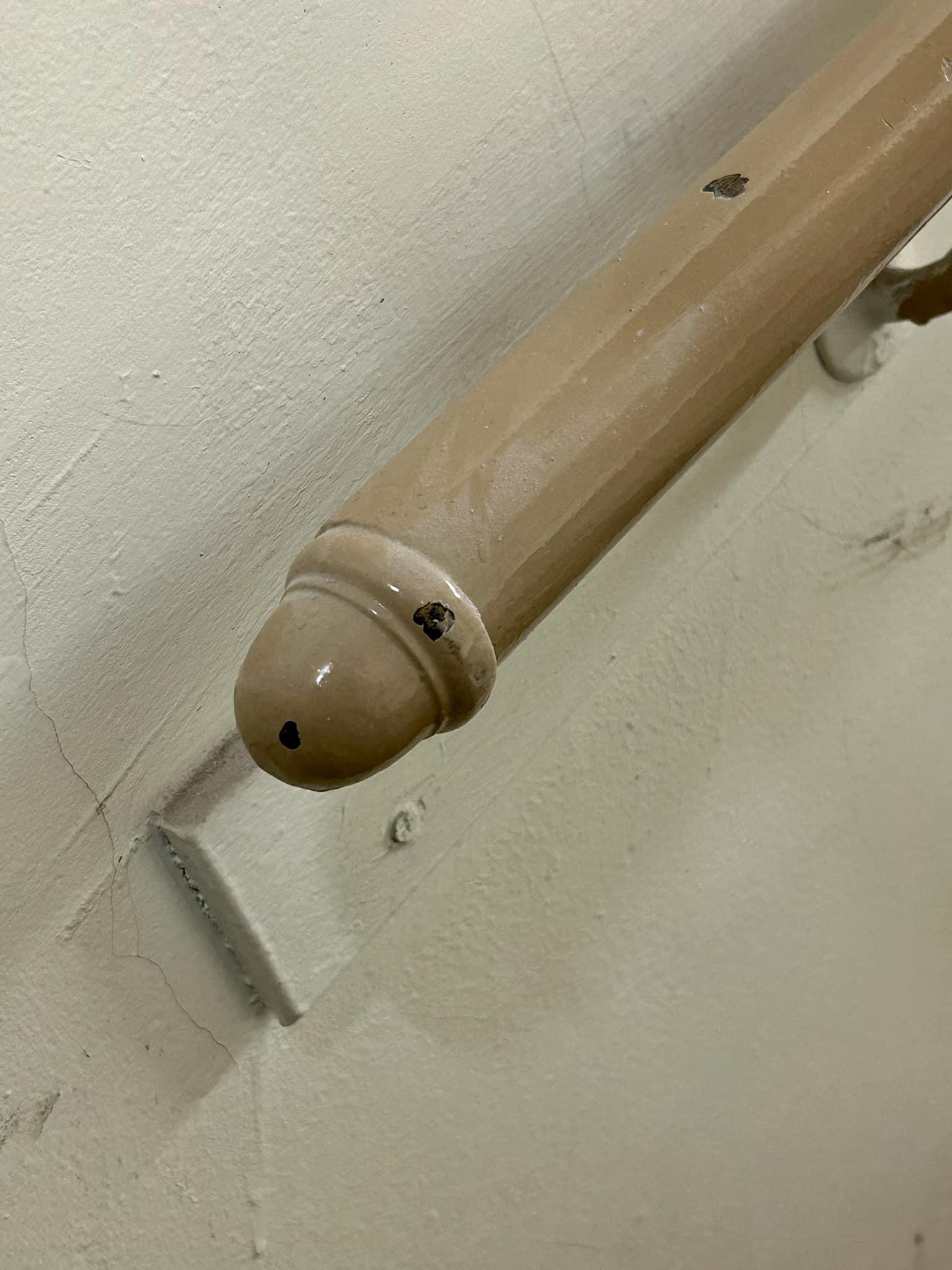 The handrail from a classic old building | Scrolller