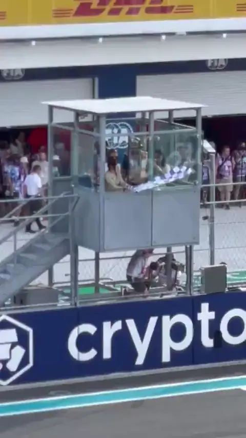 240505 Lisa waving the checkered flag @ F1 Grand Prix Miami | Scrolller