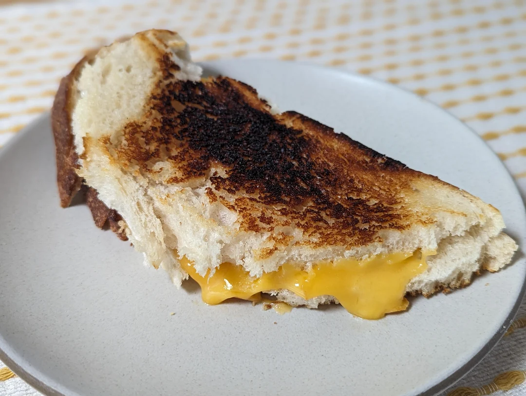 Manager's special cheddar cheese and the remainders of a loaf. | Scrolller