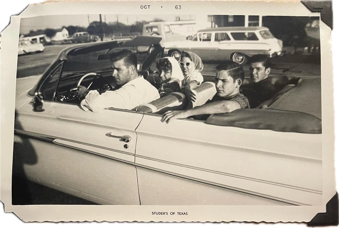 My grandpa in his ‘61 Chevy convertible, looking smooth as hell. | Scrolller