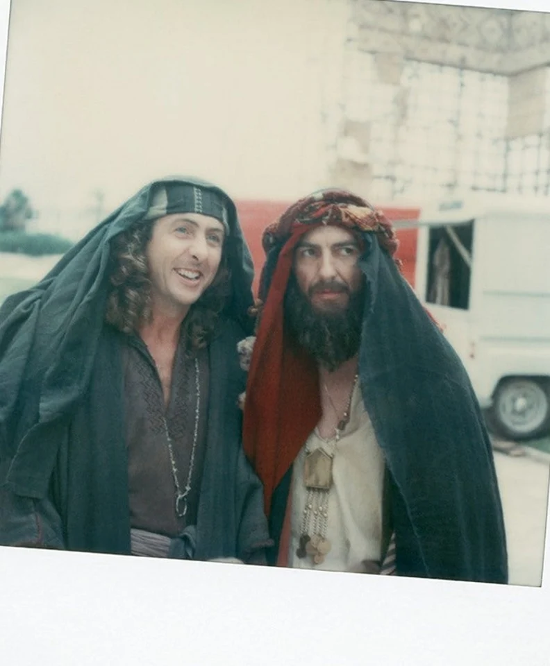 Eric Idle and George Harrison on the set of Life of Brian 1978 | Scrolller