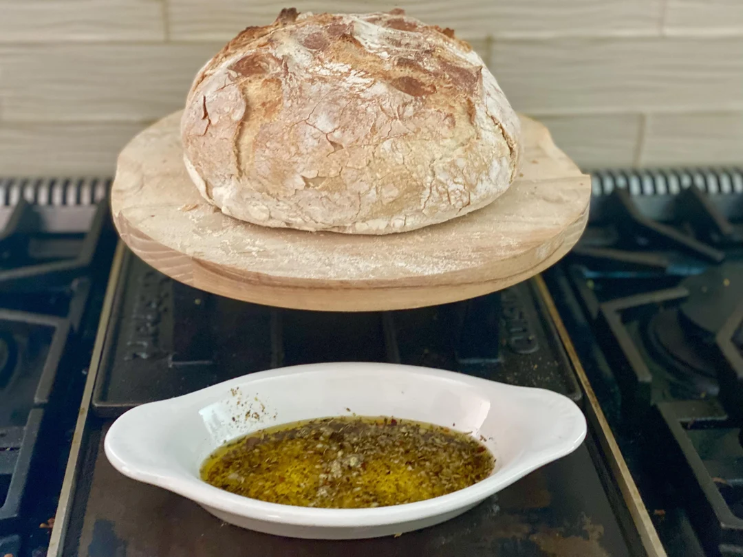 Rustic loaf and a EVOO dip = perfect snack | Scrolller